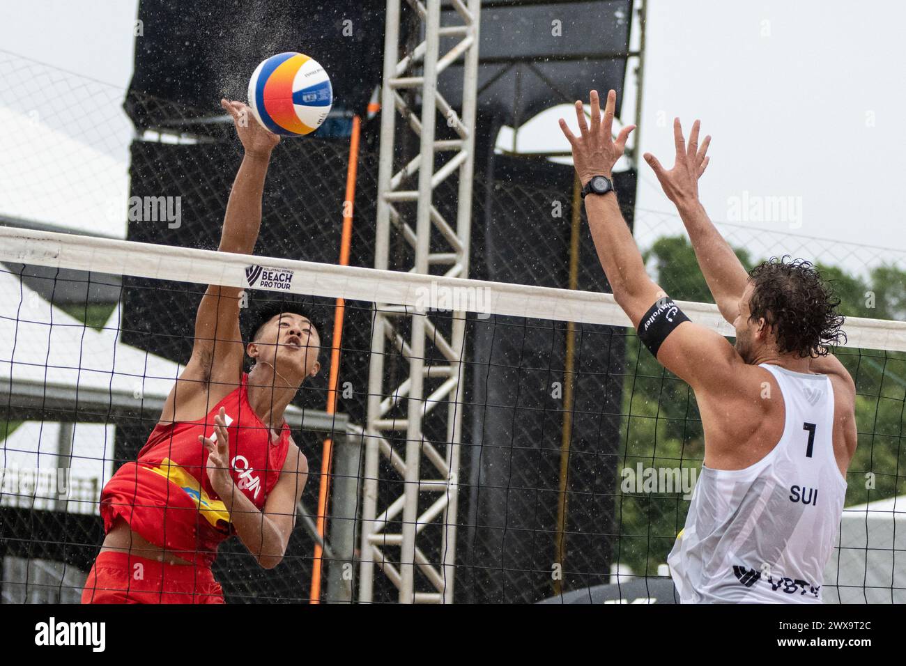 Saquarema, Brazil. 28th Mar, 2024. Wang Yanwei (L) of China competes ...