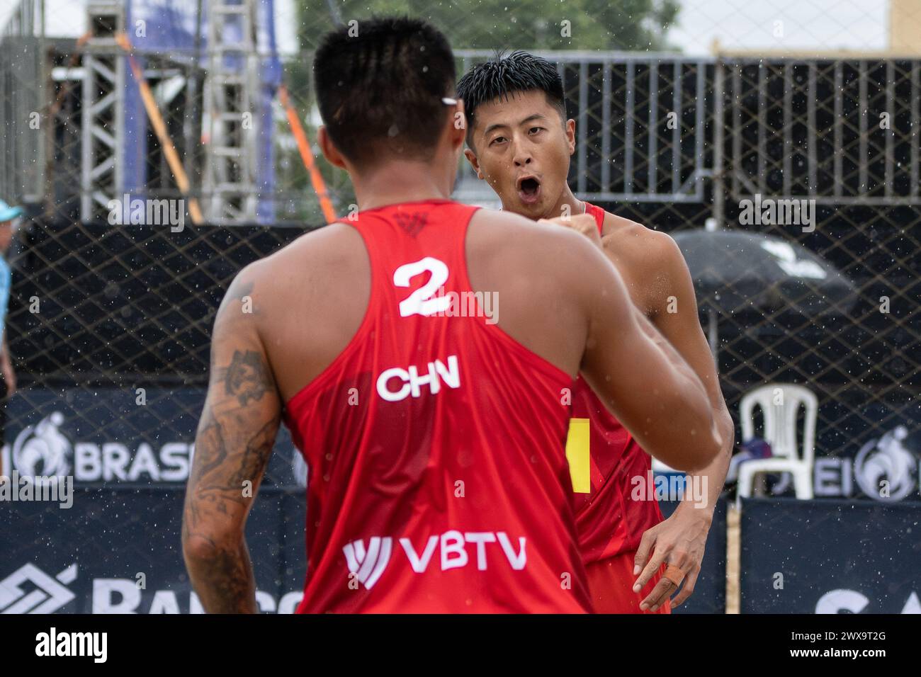 Saquarema, Brazil. 28th Mar, 2024. Wang Yanwei (R)/Li Jie of China ...