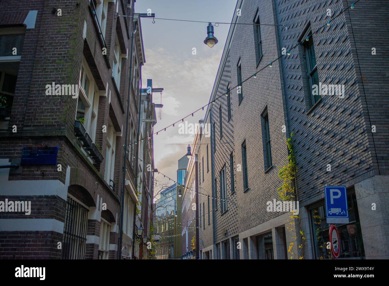 Amsterdam's buildings and streets blend picturesque canals, historic ...