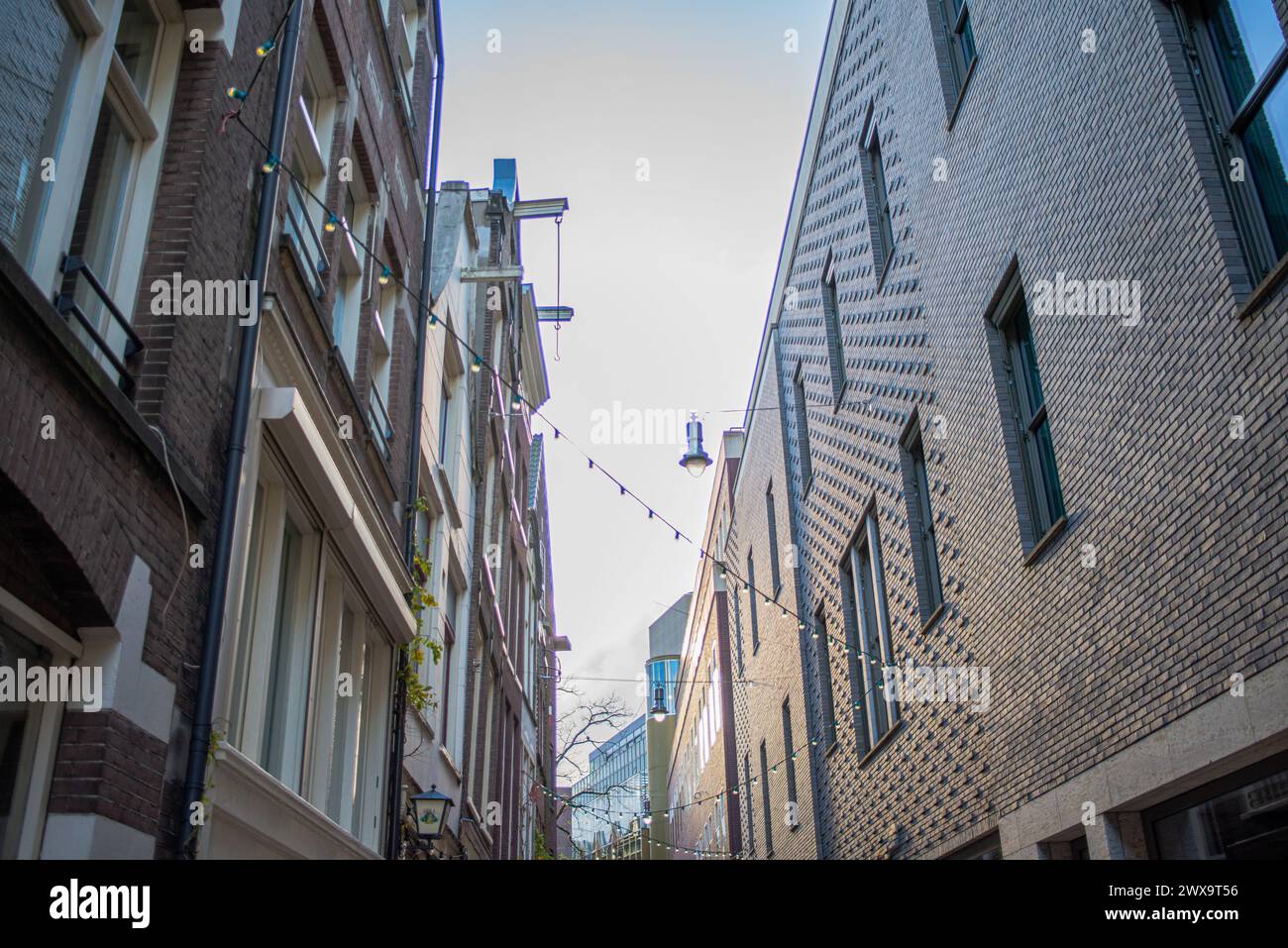 Amsterdam's buildings and streets blend picturesque canals, historic ...