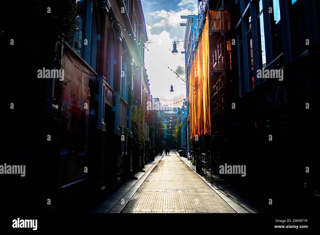 Amsterdam's buildings and streets blend picturesque canals, historic ...