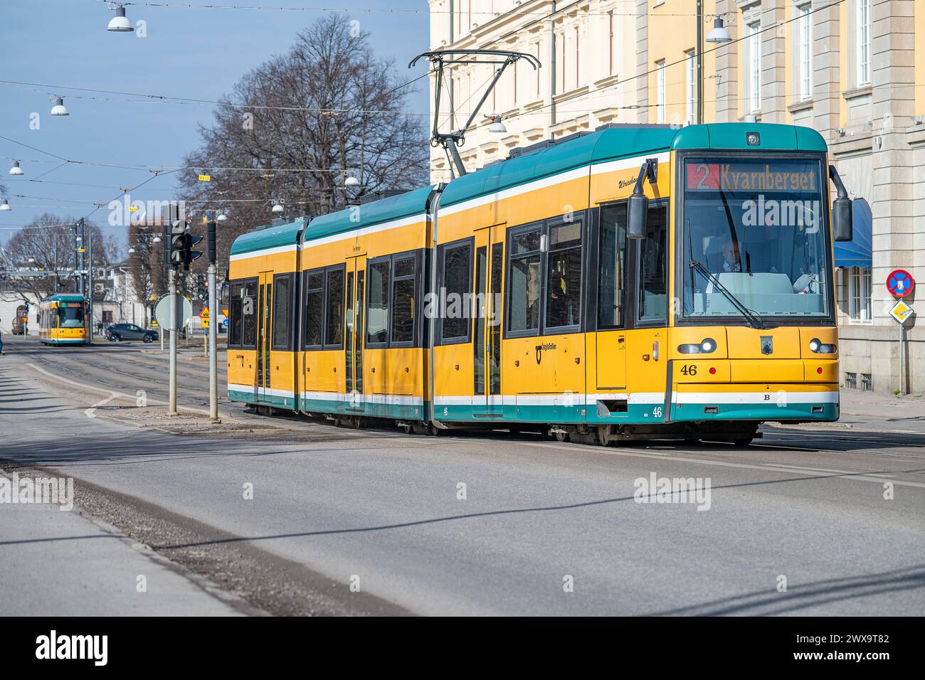 Tram on main street Drottningatan in the city of Norrkoping during ...