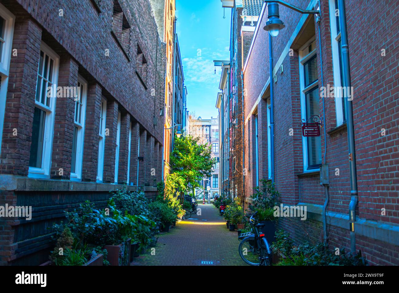Amsterdam's buildings and streets blend picturesque canals, historic ...