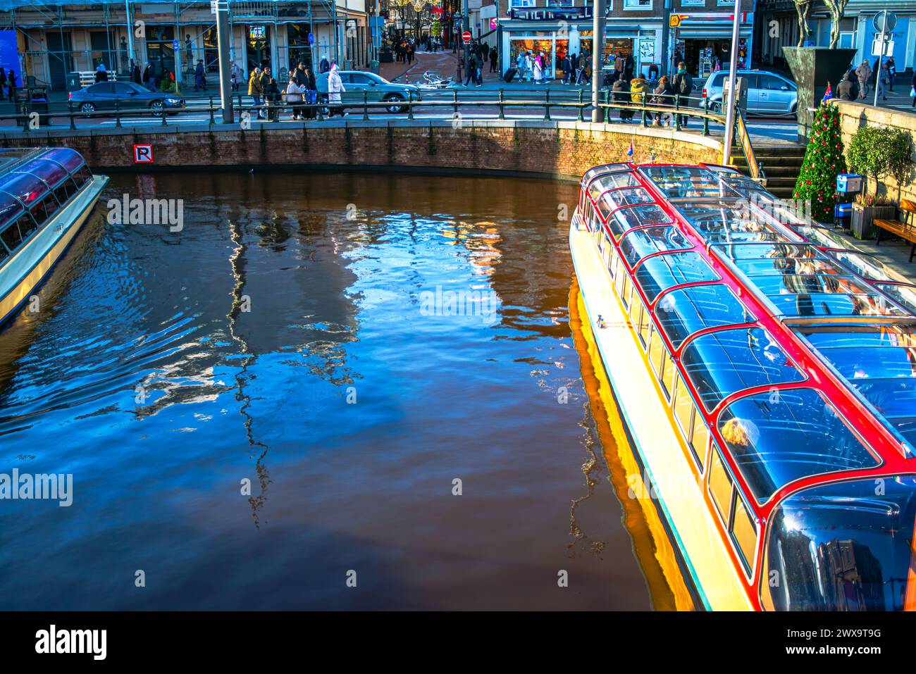 Embark on a picturesque journey through Amsterdam's canals aboard a ...