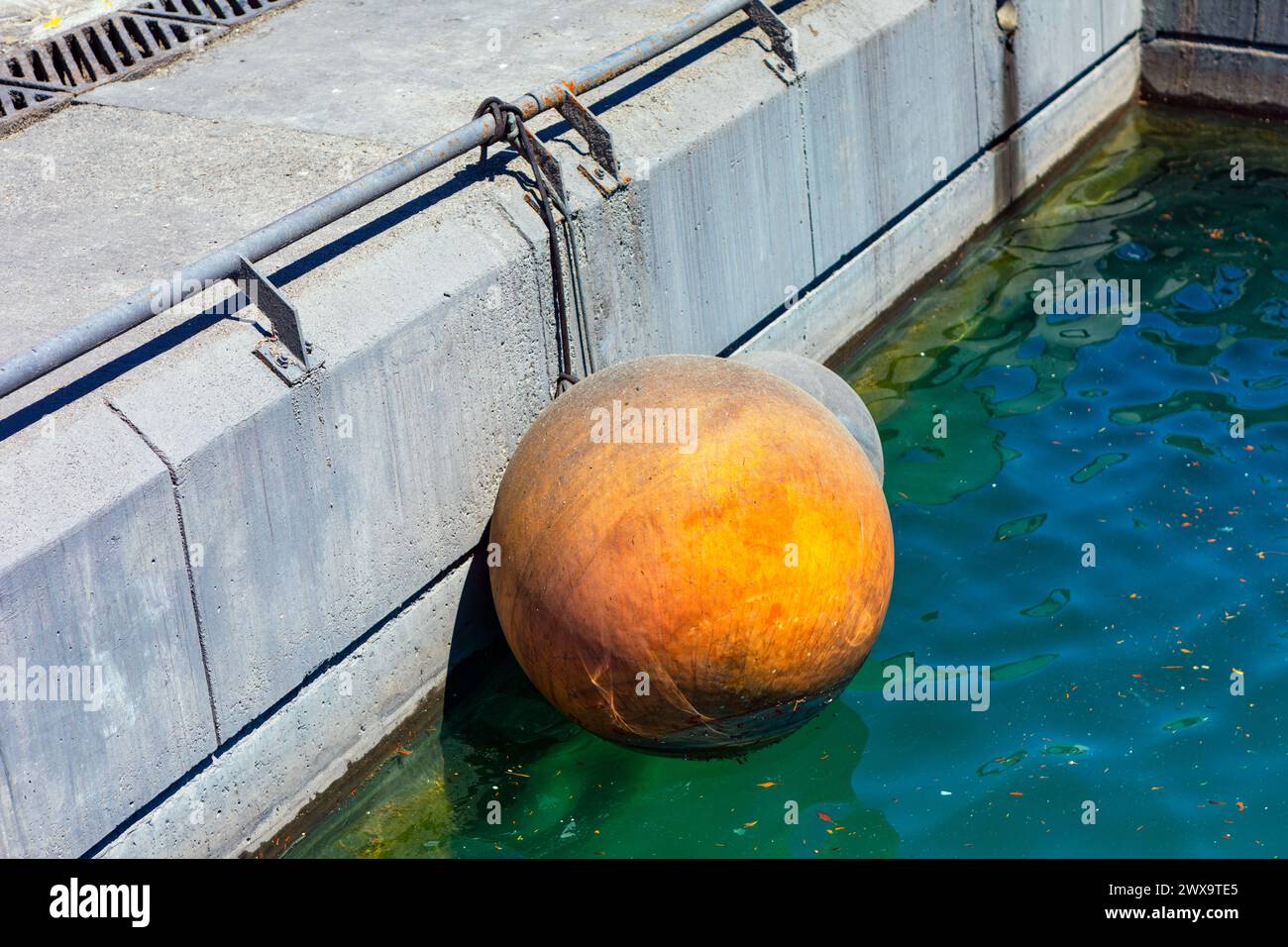Rubber Floating Ball at Harbor for Mooring Boats Stock Photo - Alamy