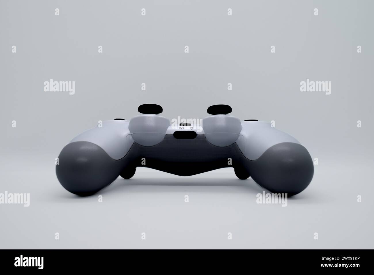 Immerse yourself in the world of gaming with a sleek white gamepad, the ...