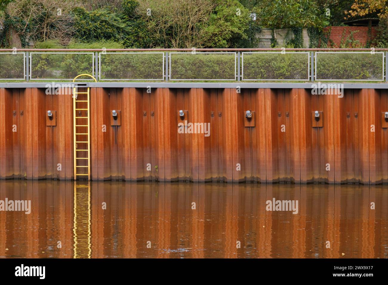 Ladder at the sheet pile wall of the Dortmund-Ems-Kanal Stock Photo - Alamy