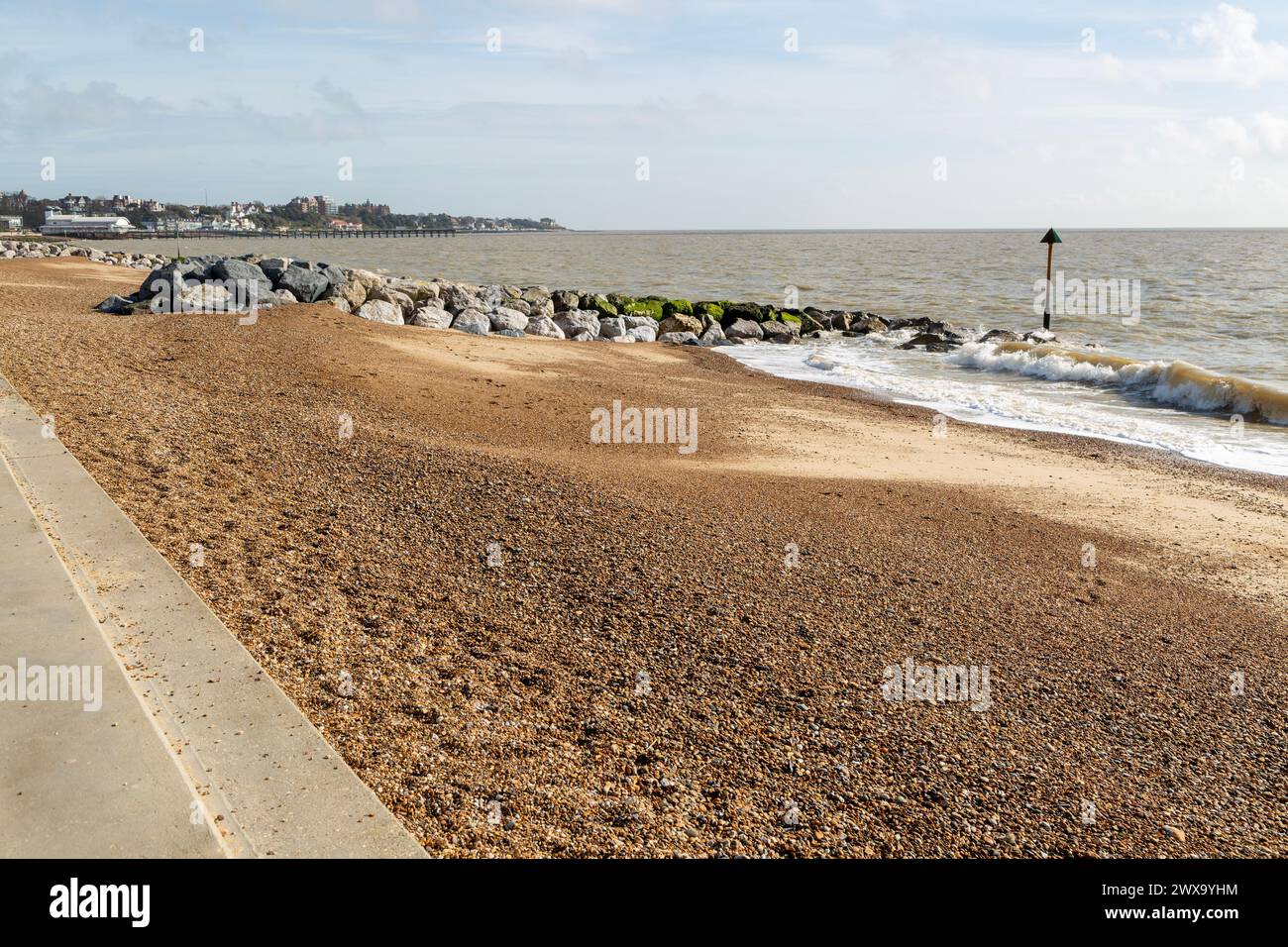 Rock armour groynes building beach sediment, North Sea coast ...