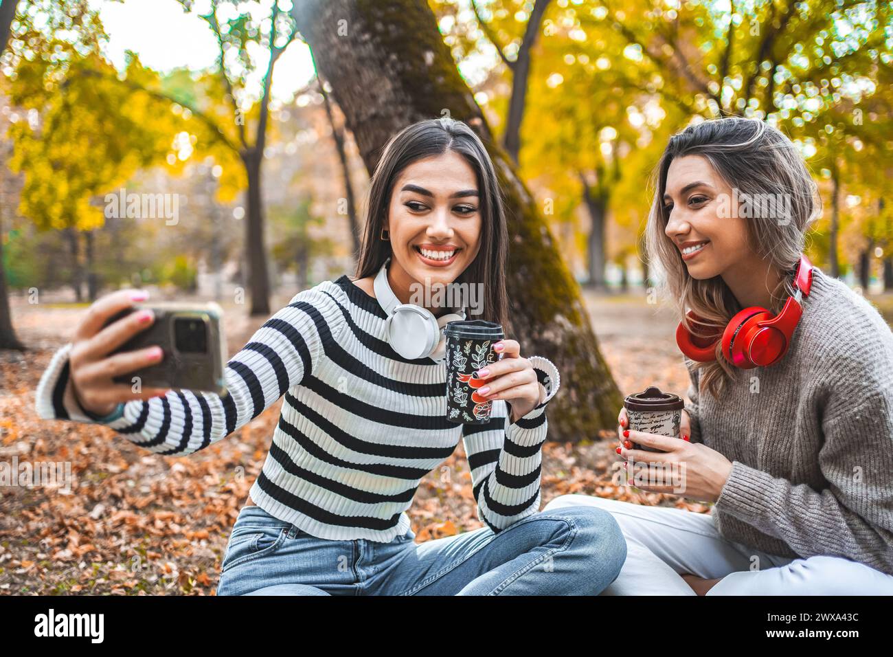 Two women enjoying relaxed moment hi-res stock photography and images ...