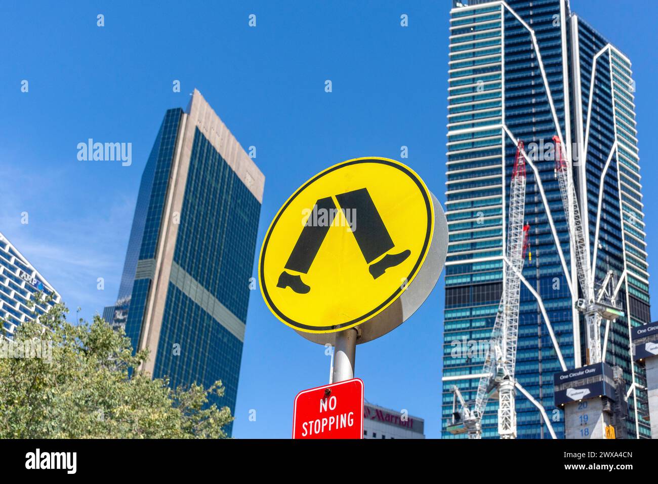 High rise buildings pedestrian crossing sign george street the r hi-res ...