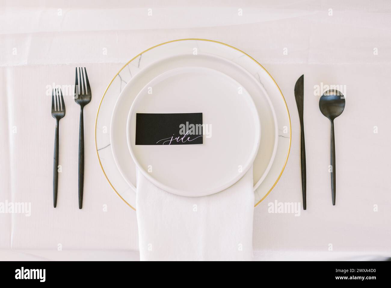 Sophisticated table setting with name card Stock Photo - Alamy