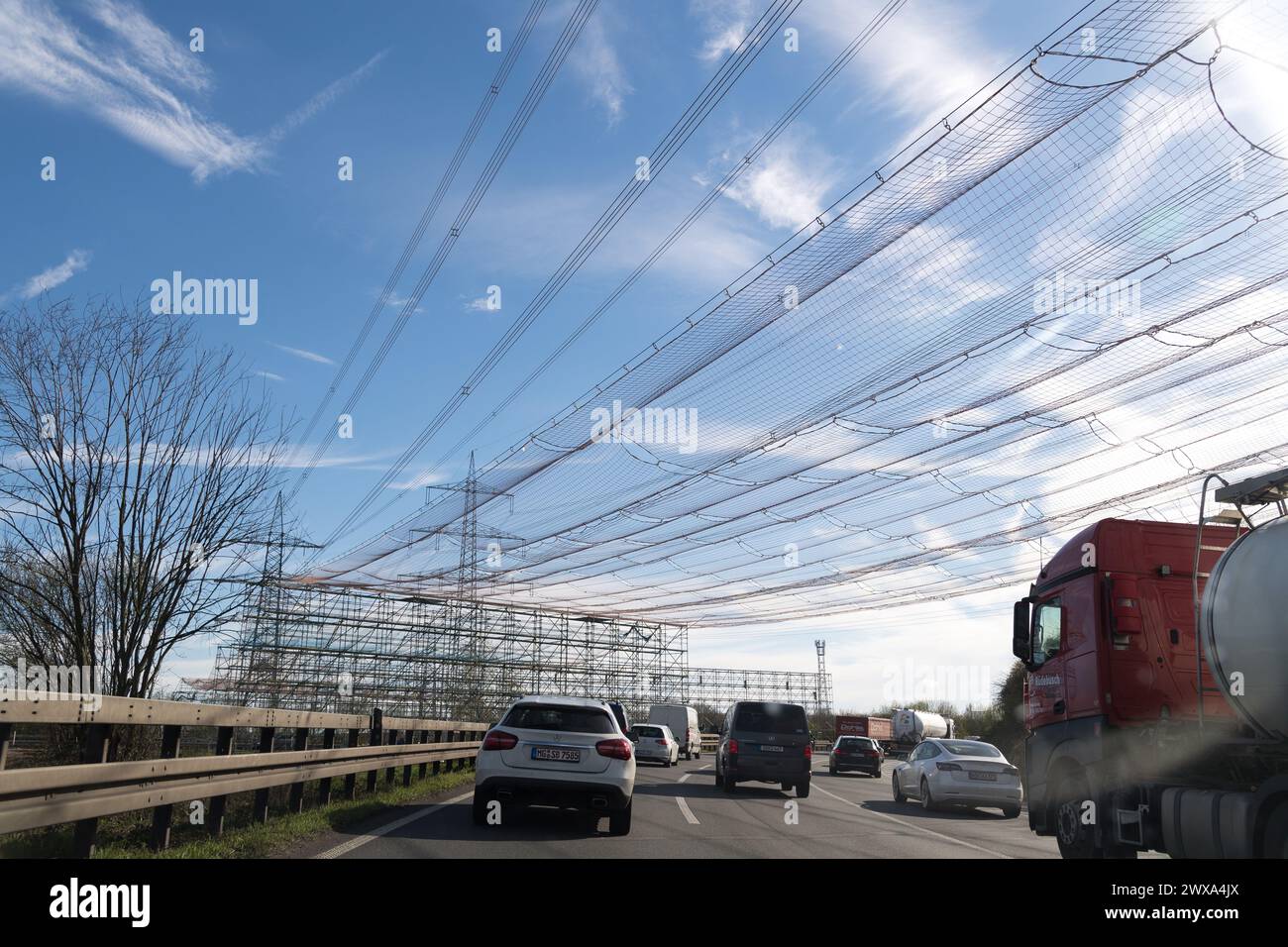 High voltage power lines over Bundesautobahn 46 in North Rhine-Westphalia, Germany © Wojciech ...