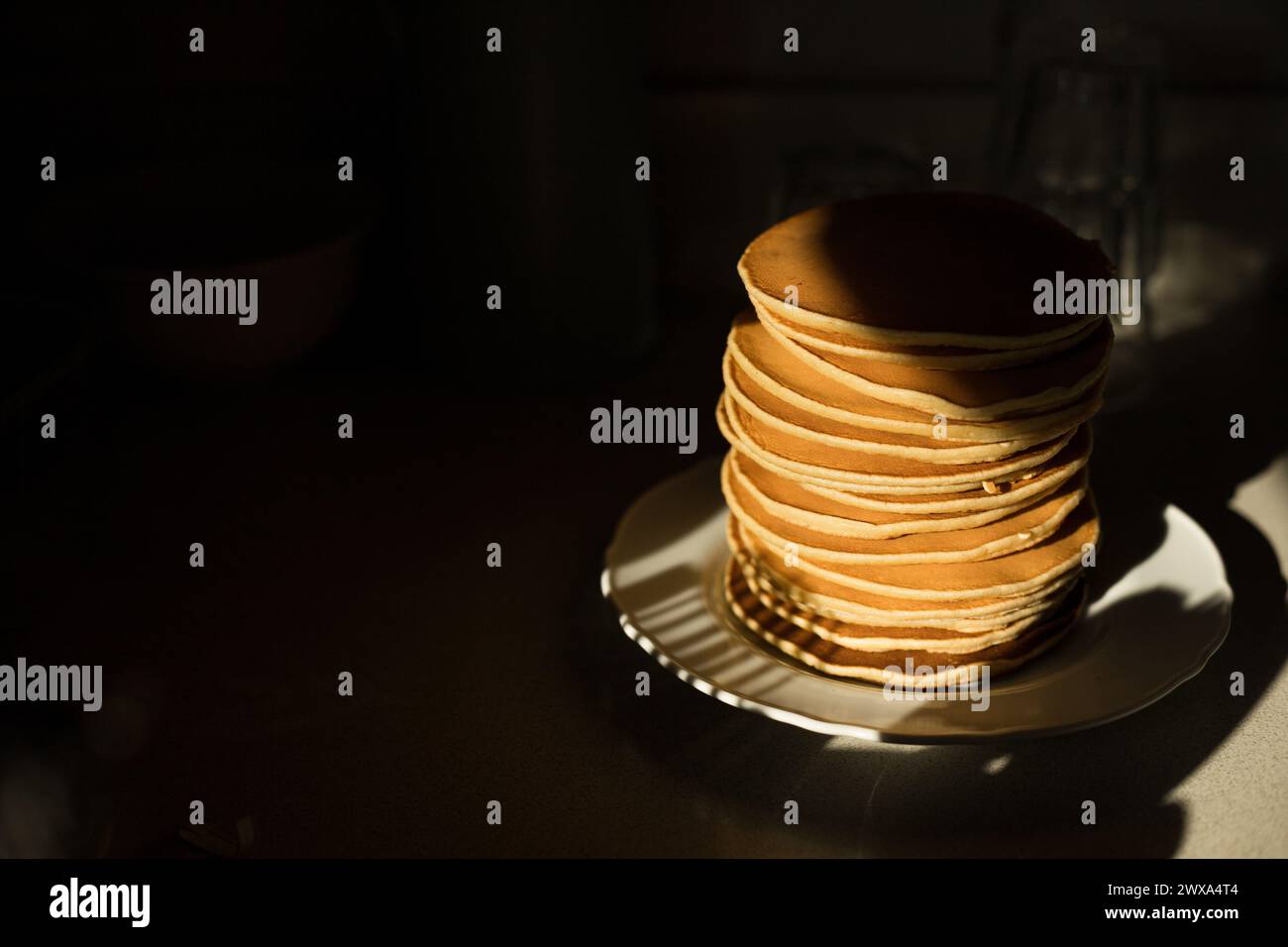 Pile of pancakes on plate, early family breakfast. Horizontal mockup ...