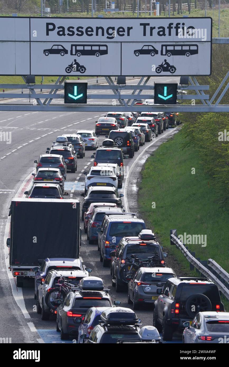 Passengers queue to enter the Eurotunnel site in Folkestone in Kent as ...