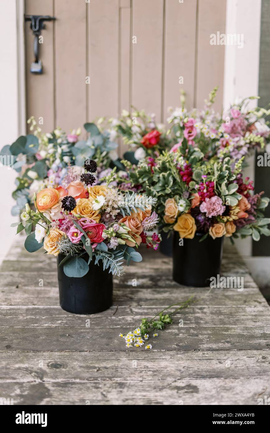 Spring flower buckets in front of flower shop Stock Photo - Alamy