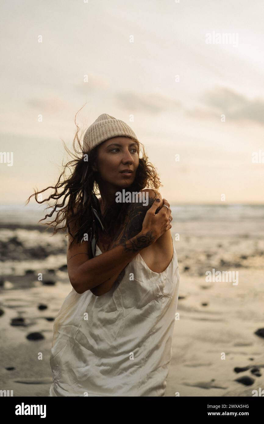 Woman tattoos on beach hi-res stock photography and images - Alamy