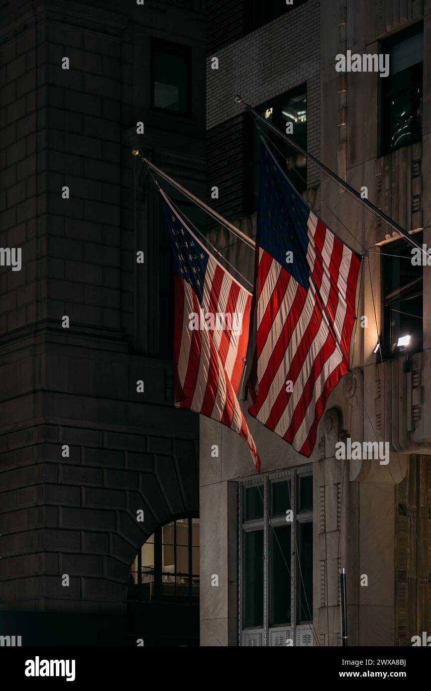 American Flags Illuminated at Night on New York Building Facade Stock ...