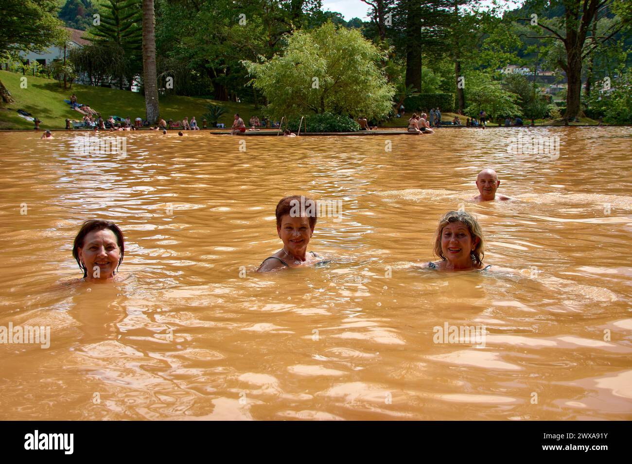 Furnas, Azores, June,06,2022;Landscape view and people swimming in the ...