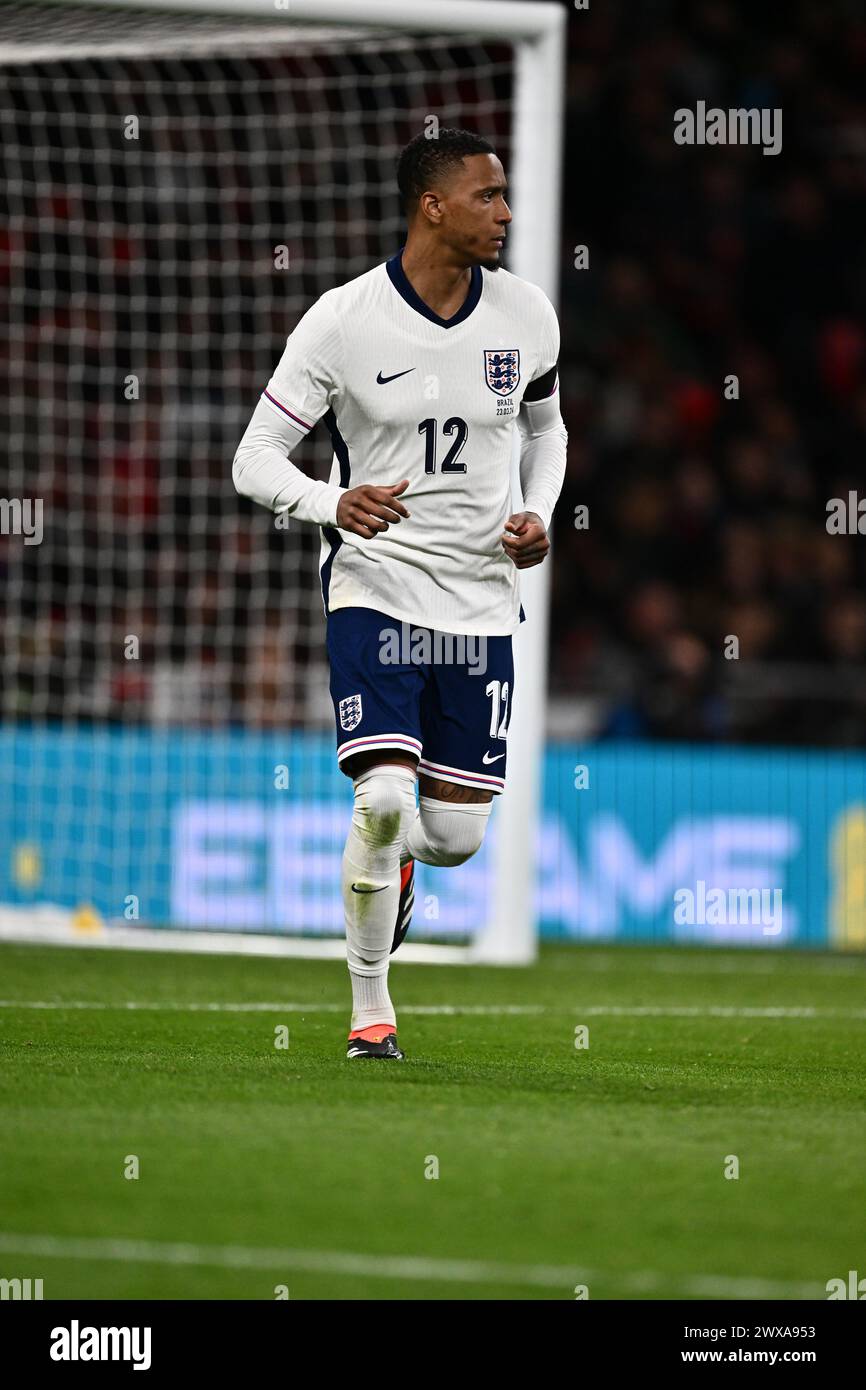 LONDON, ENGLAND - MARCH 23: Ezri Konsa of England in home kit, full ...