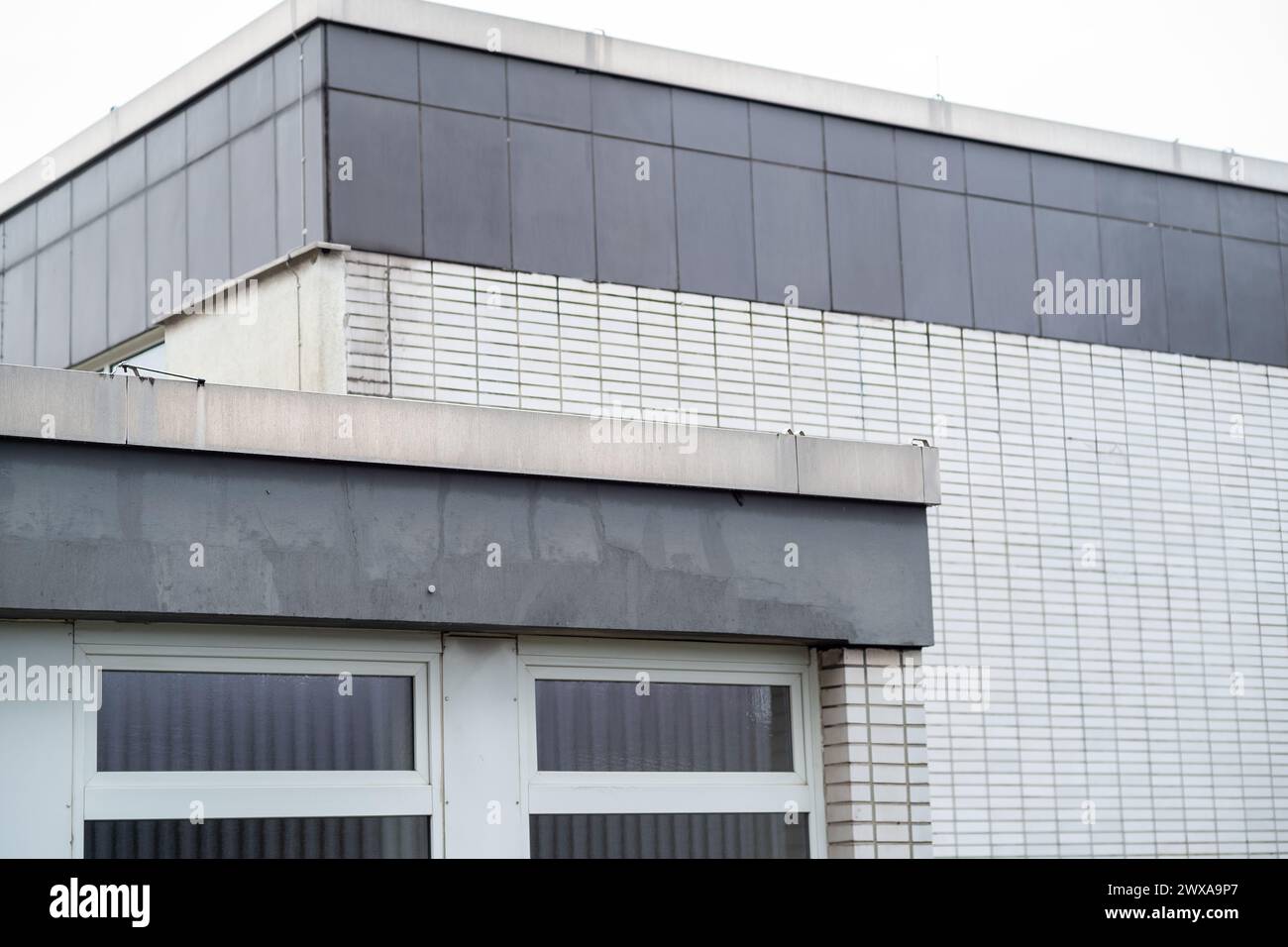 building with gray flat roof Stock Photo - Alamy