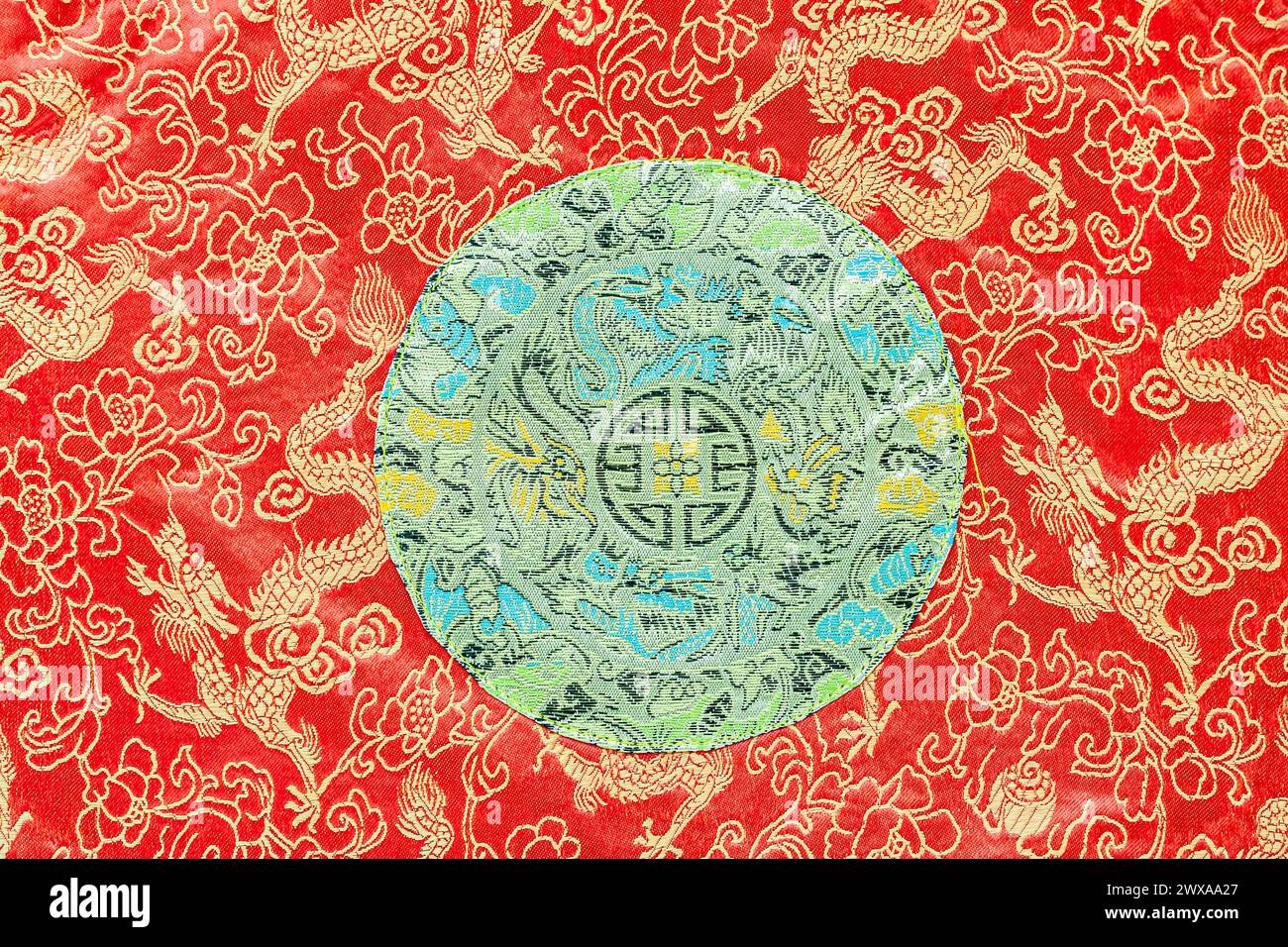 Traditional Chinese motifs on canvas hand embroidered Stock Photo - Alamy