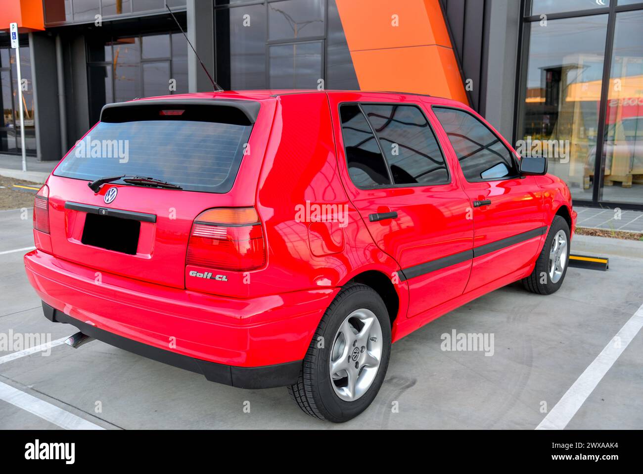 VW Volkswagen Golf Flash Red and black on a late sunny afternoon photo ...