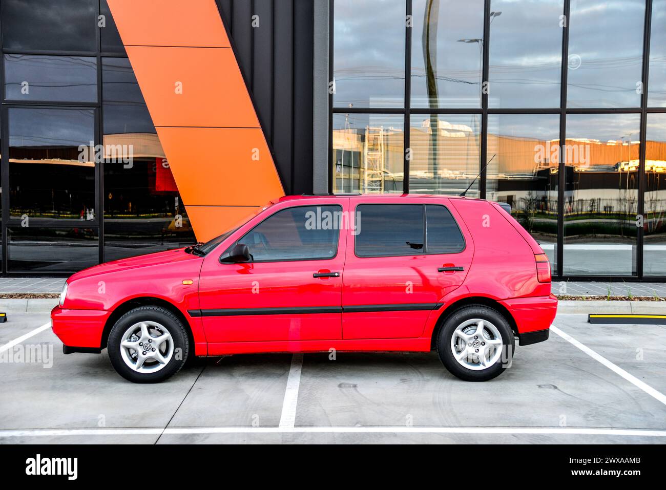 VW Volkswagen Golf Flash Red and black on a late sunny afternoon photo ...