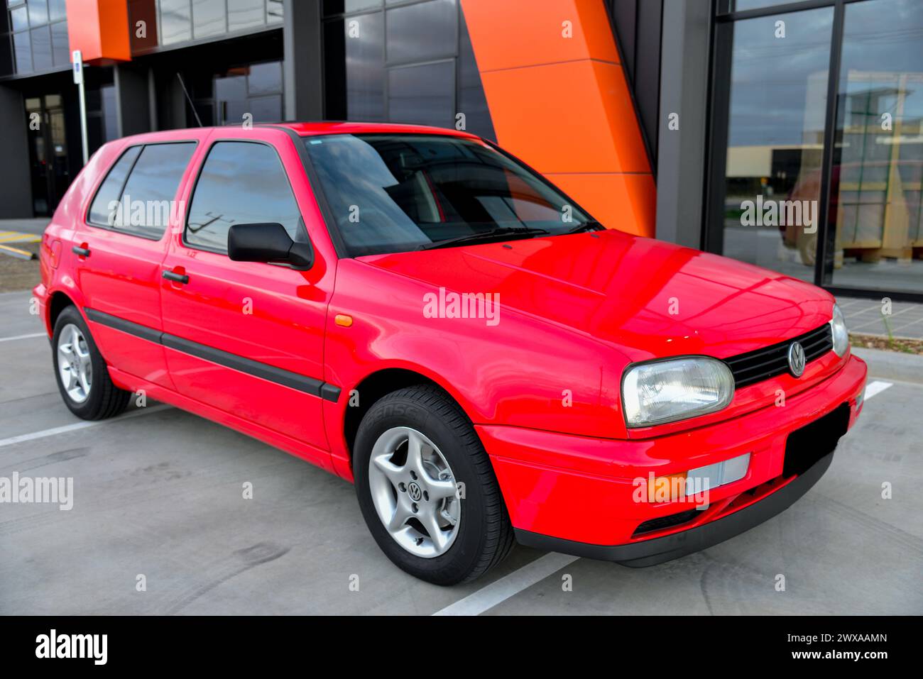 VW Volkswagen Golf Flash Red and black on a late sunny afternoon photo ...