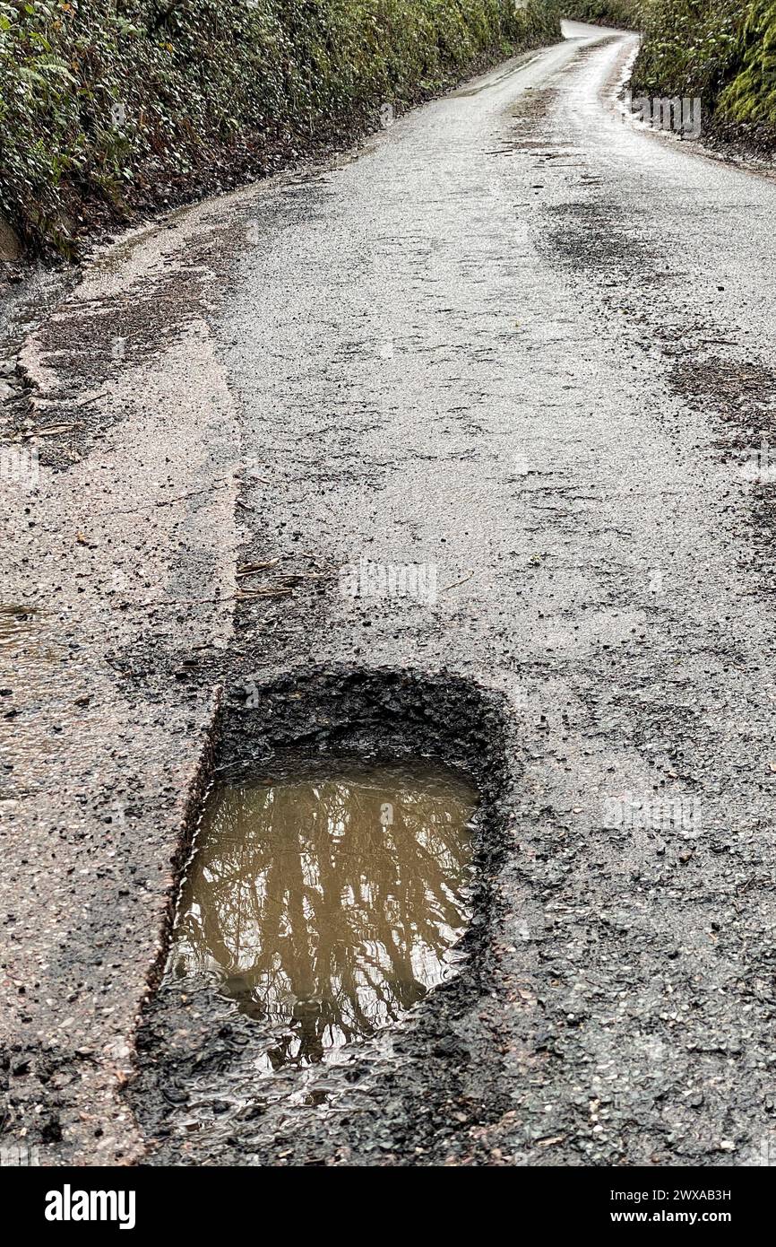 Concealing how deep the pothole is hi-res stock photography and images ...