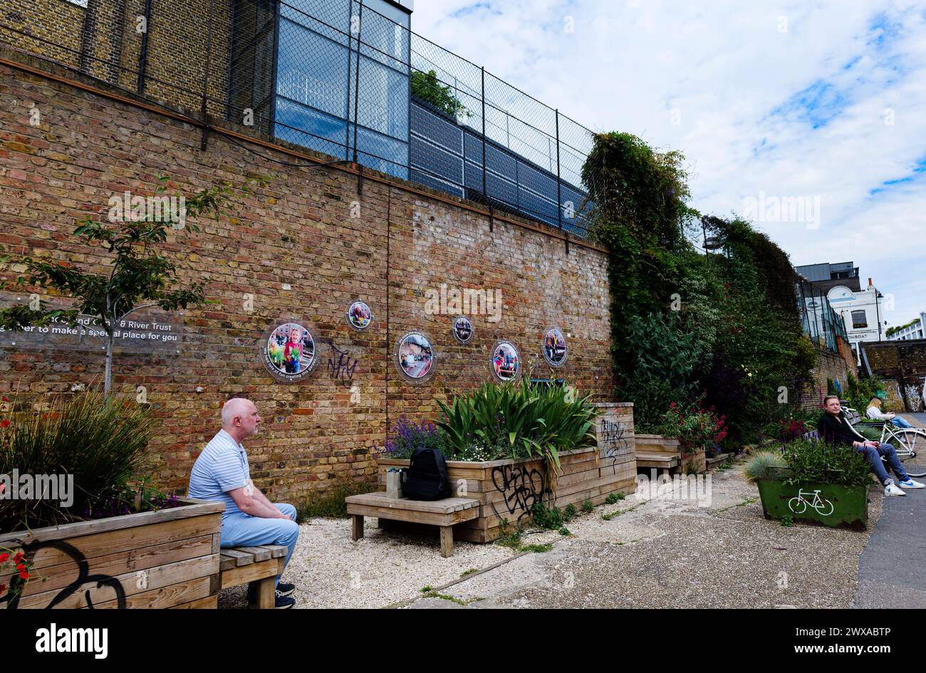 London - 06 03 2022: People sitting in the garden dedicated to Crystal ...