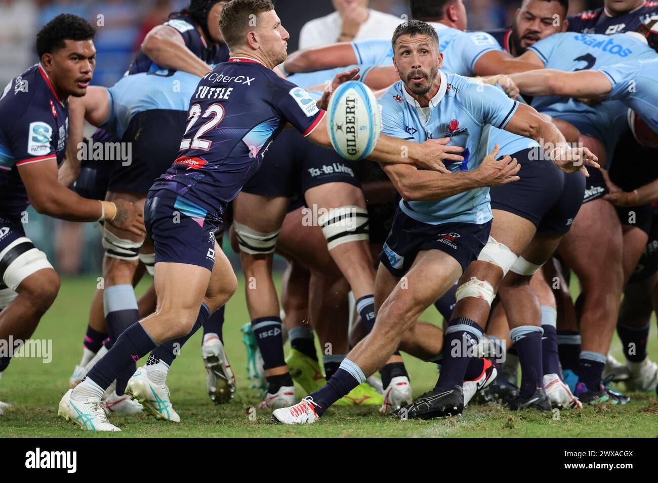 SYDNEY, AUSTRALIA - MARCH 29: Jake Gordon of the Waratahs passes the ...