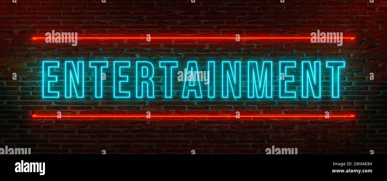 Entertainment Entertainemnt sign. Brick wall at night with the word ...