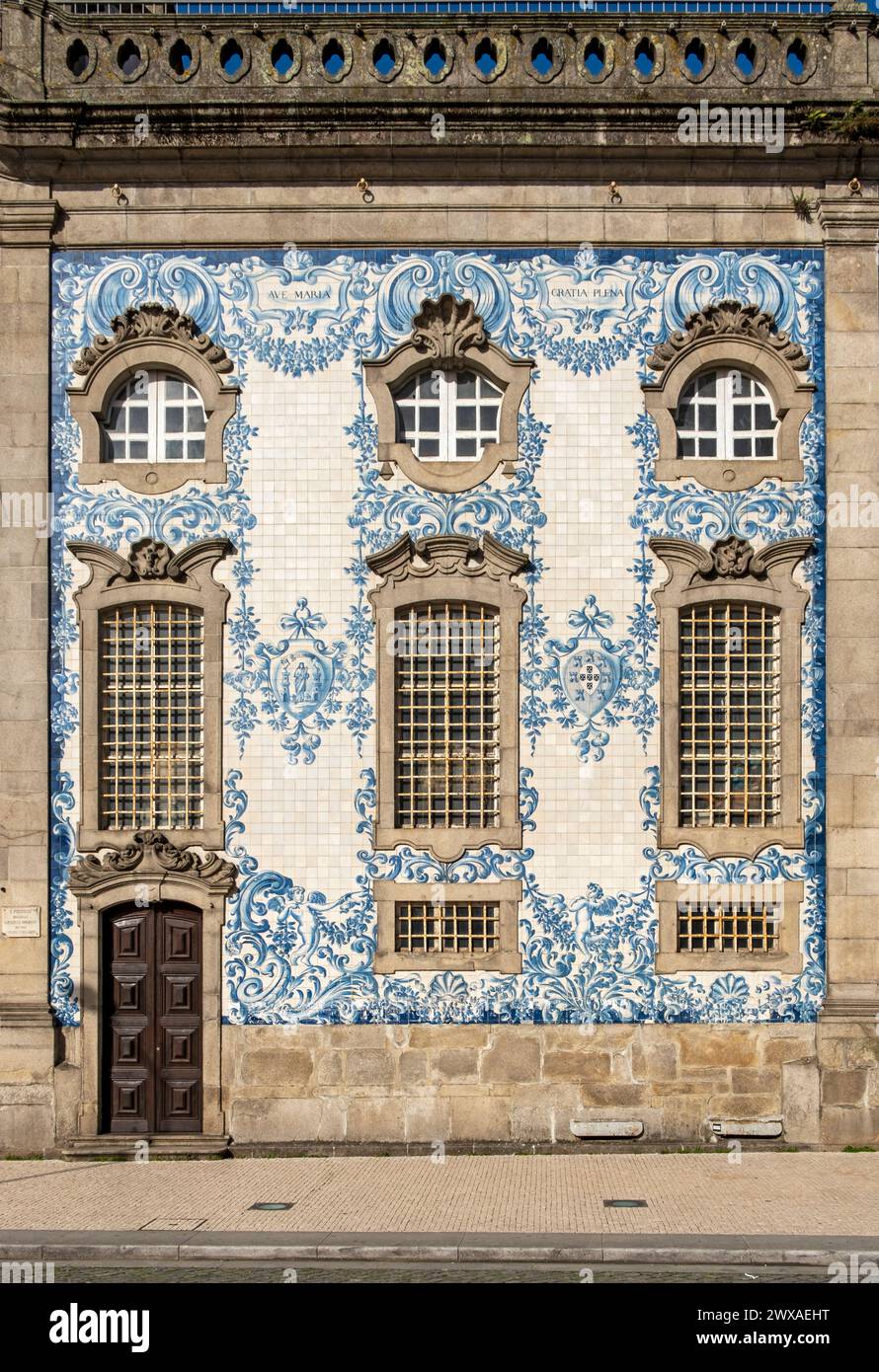 The facade of Igreja do Carmo church, adorned with intricate blue and ...
