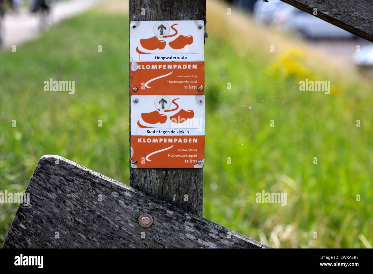 signs on poles to indicate a clog trail as a nature walk in Hattem in ...