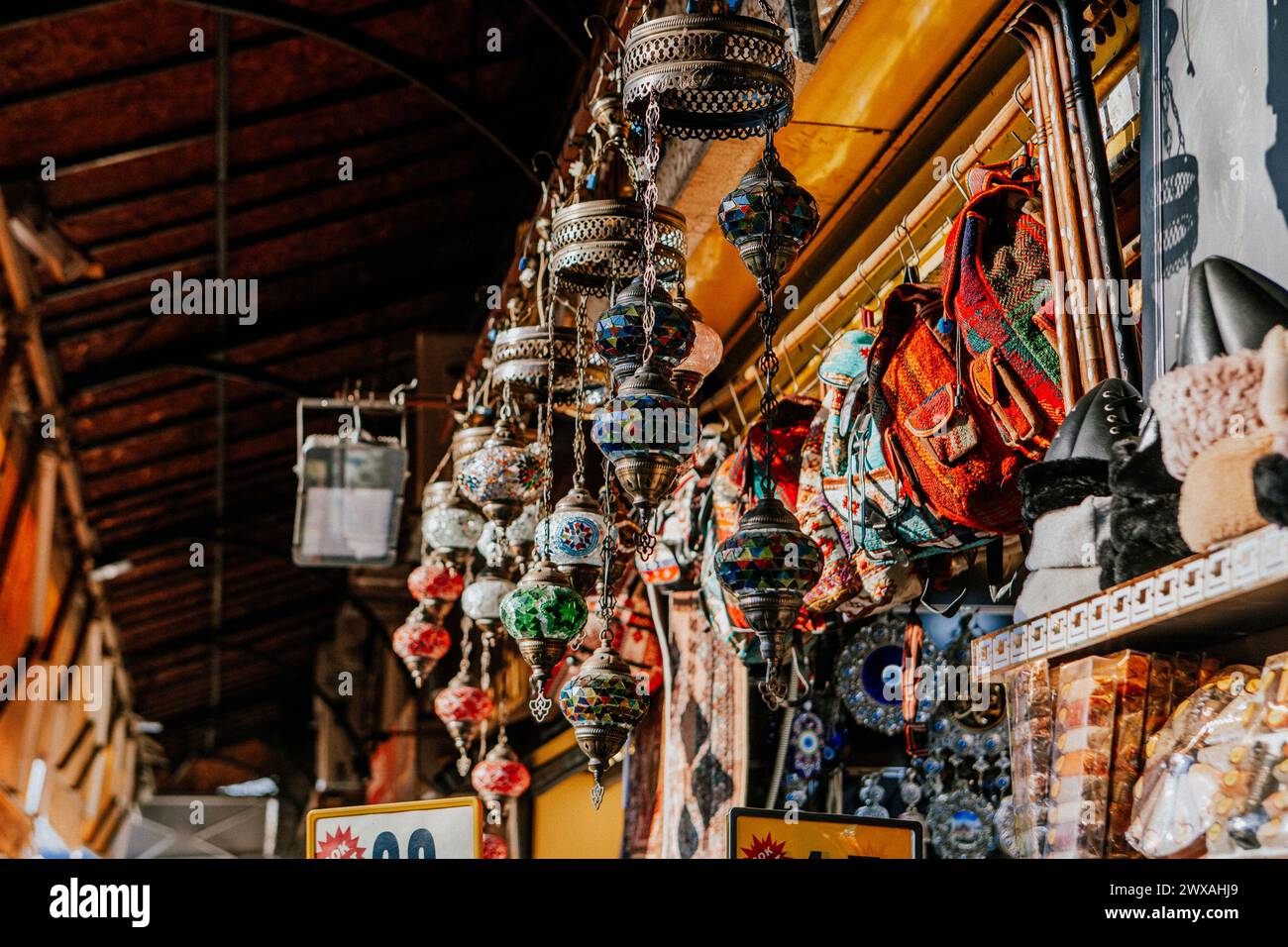 Colorful assortment of handicrafts, bags, and lanterns on display at a ...