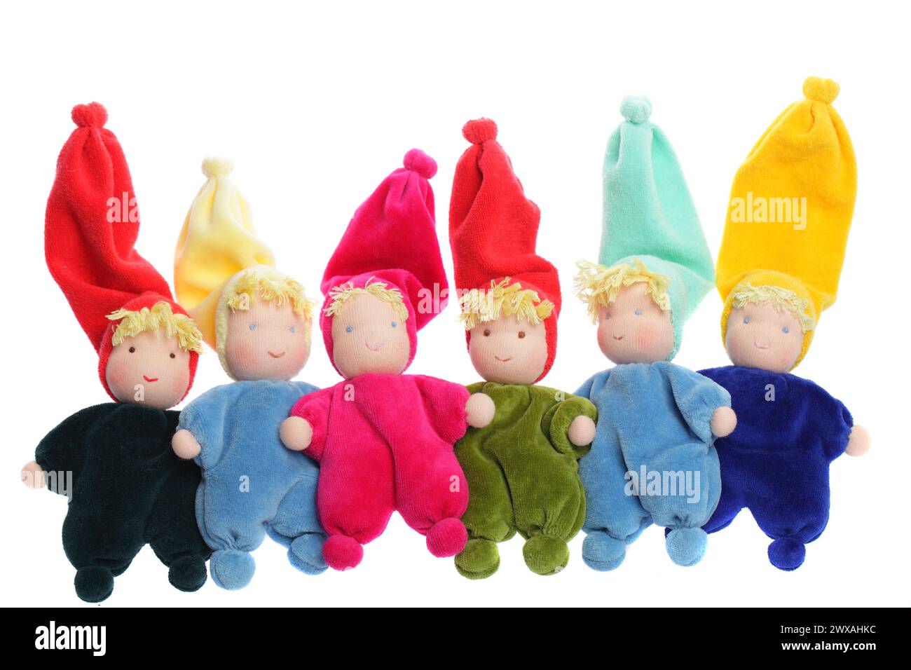 Bright textile plush doll toy isolated on white background. Red, blue ...