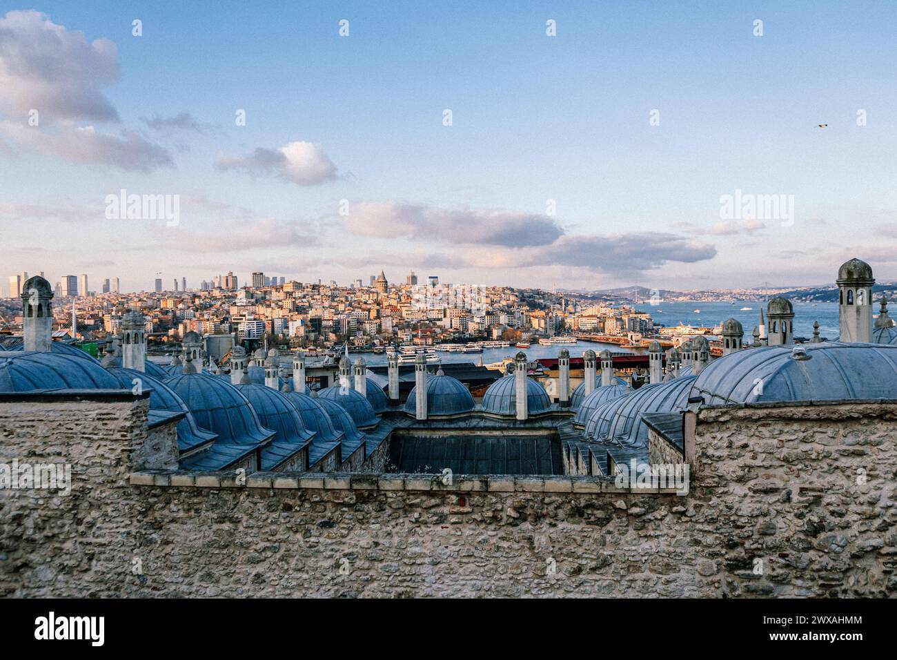 Historic cityscape with rooftops and domes against a backdrop of the ...