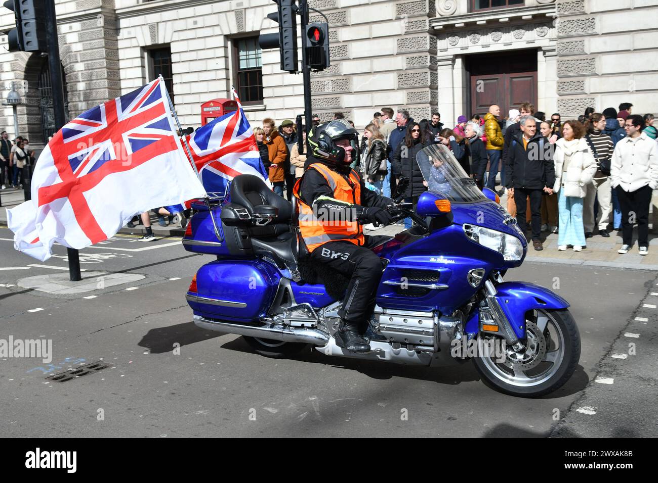 Honda Goldwing with flag in motorbike enthusiasts Easter parade through ...