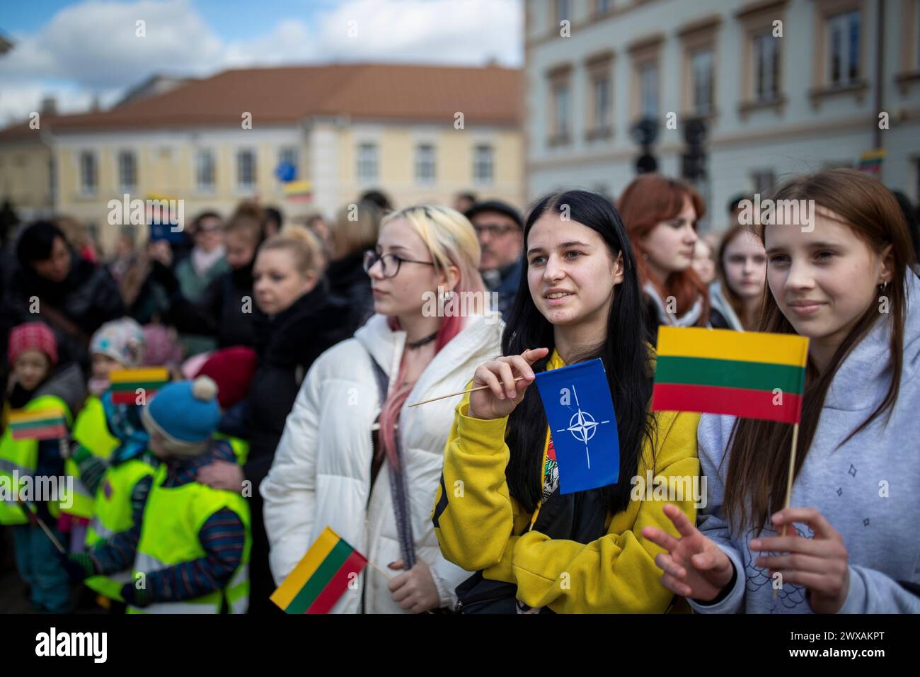 People attend a celebration for Lithuania's NATO membership 20th ...