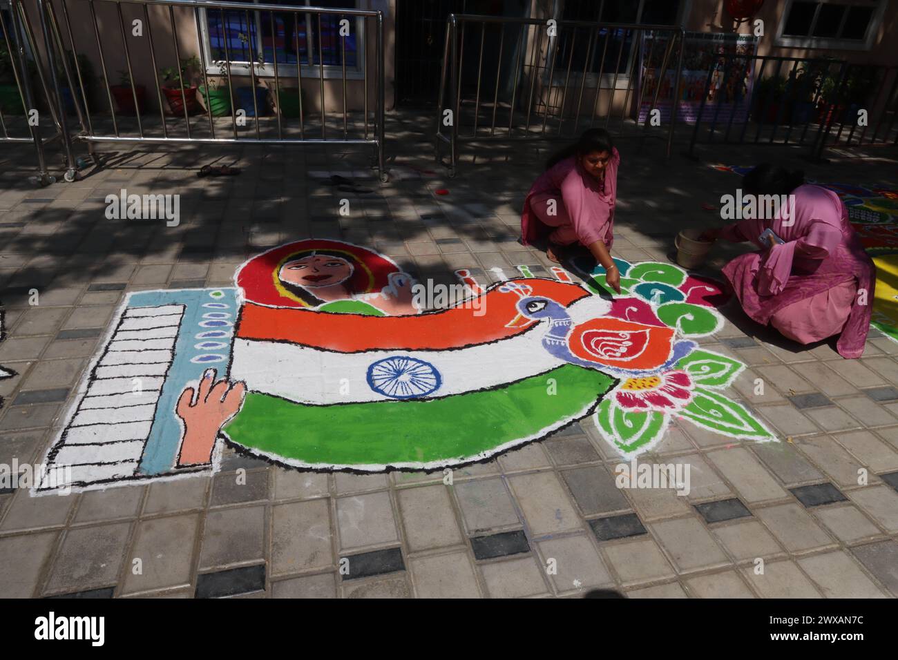Chennai, India. 29th Mar, 2024. school teachers give final touches to a ...