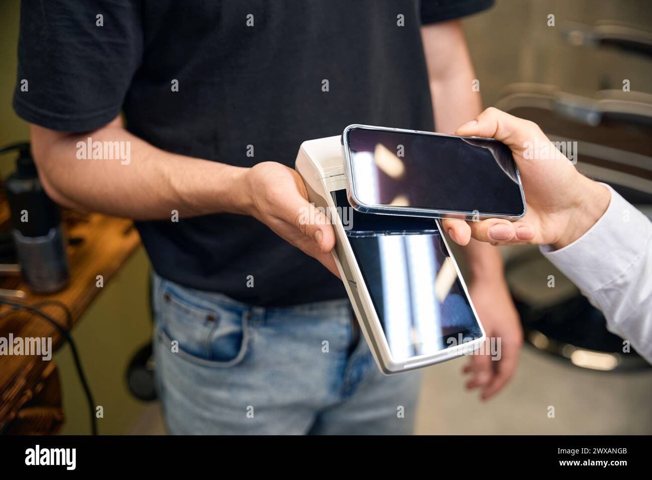 Client paying in barbershop hi-res stock photography and images - Alamy
