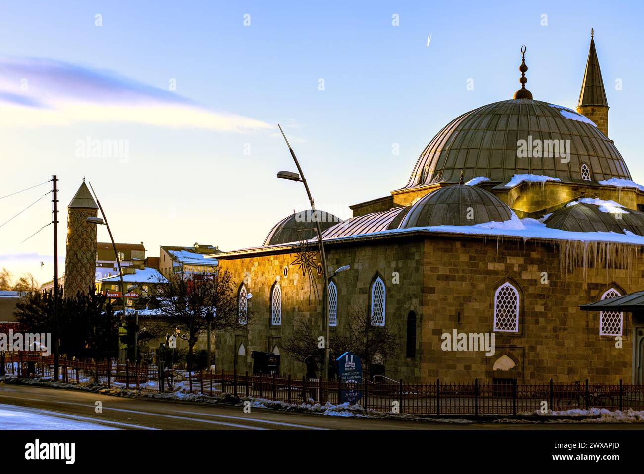 Winter dawn light illuminates Yakutiye Madrasa and Lalapasa Mosque in ...