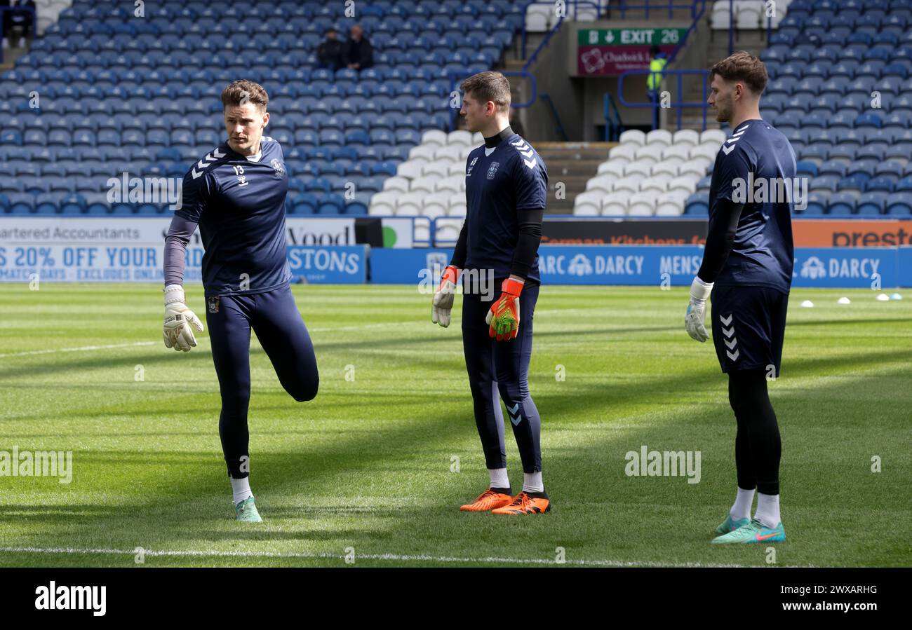 Left to right, Coventry City goalkeeper Ben Wilson, Luke Bell and ...