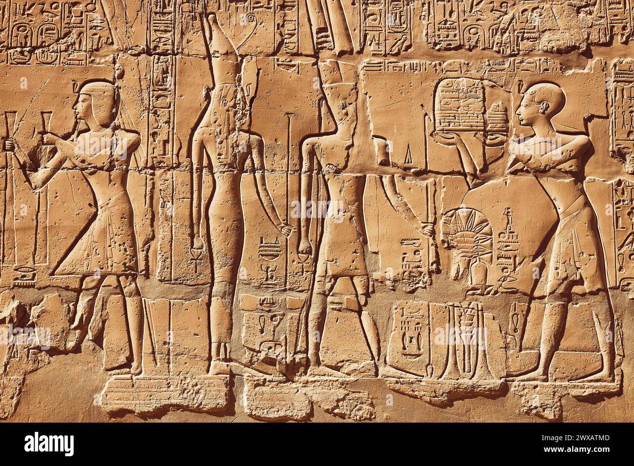 Egyptian ancient hieroglyphs. Reliefs of Egyptian gods and pharaoh ...