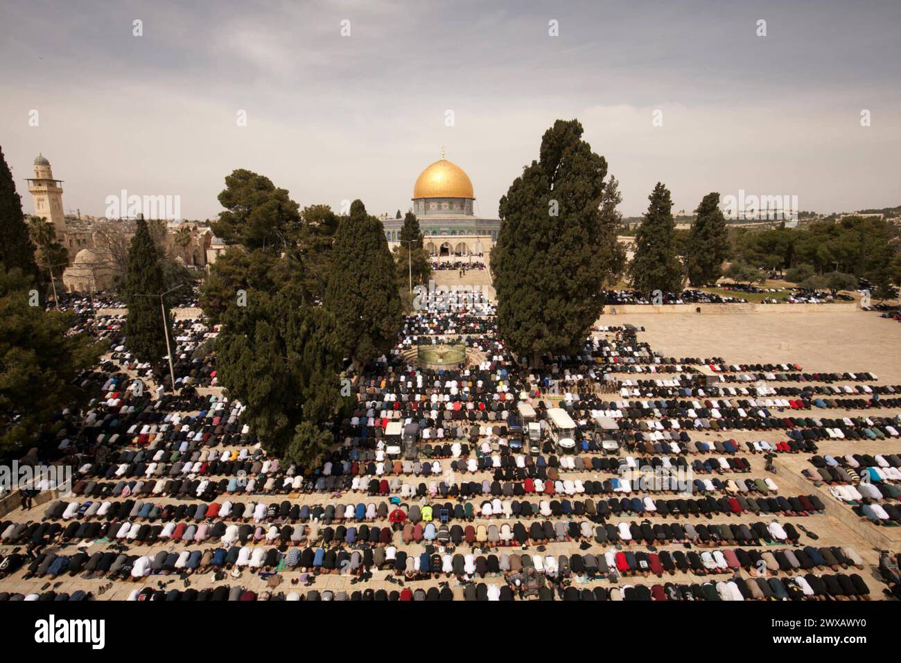 Muslims perform the third Friday prayer of the Holy month of Ramadan at ...