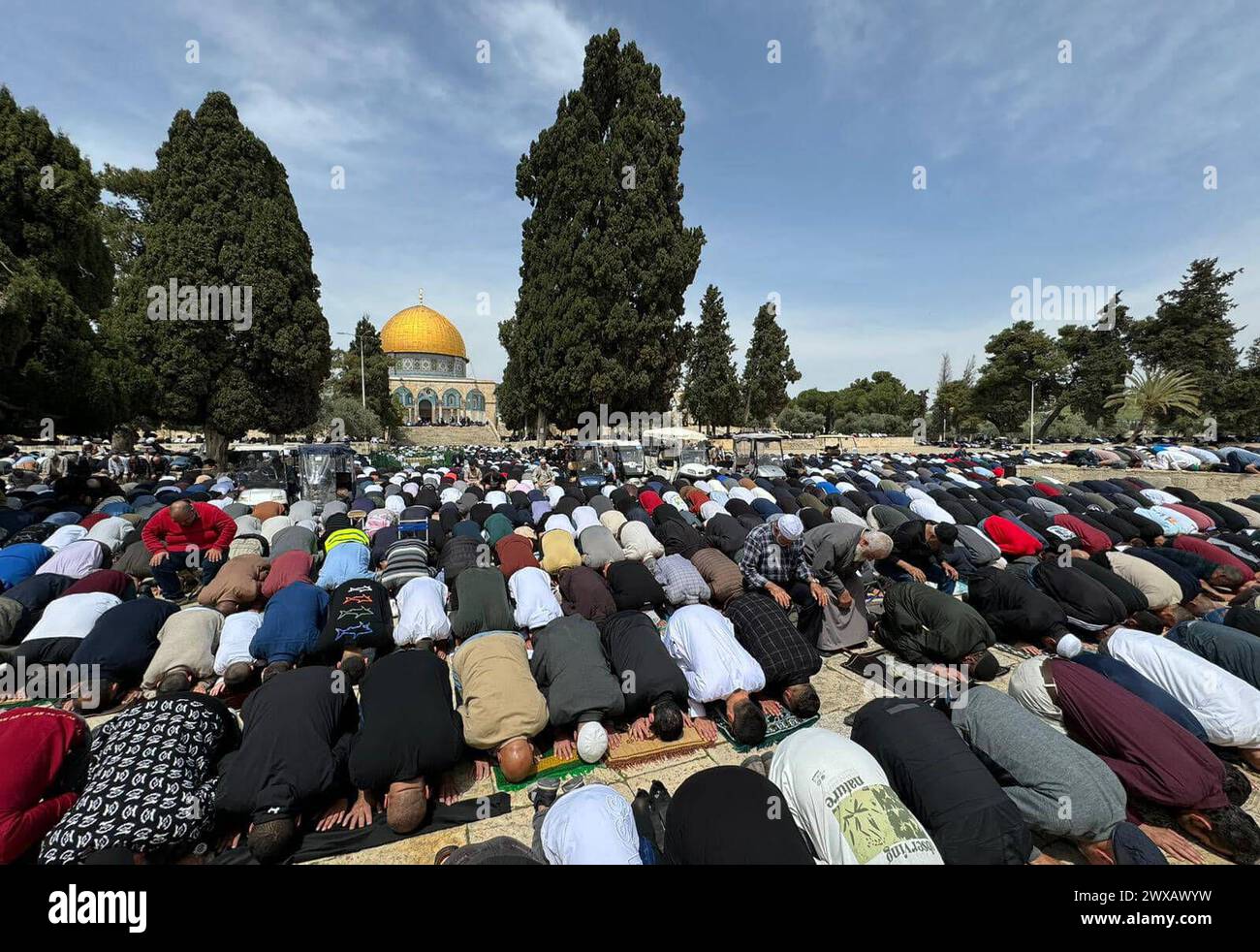 Muslims perform the third Friday prayer of the Holy month of Ramadan at ...