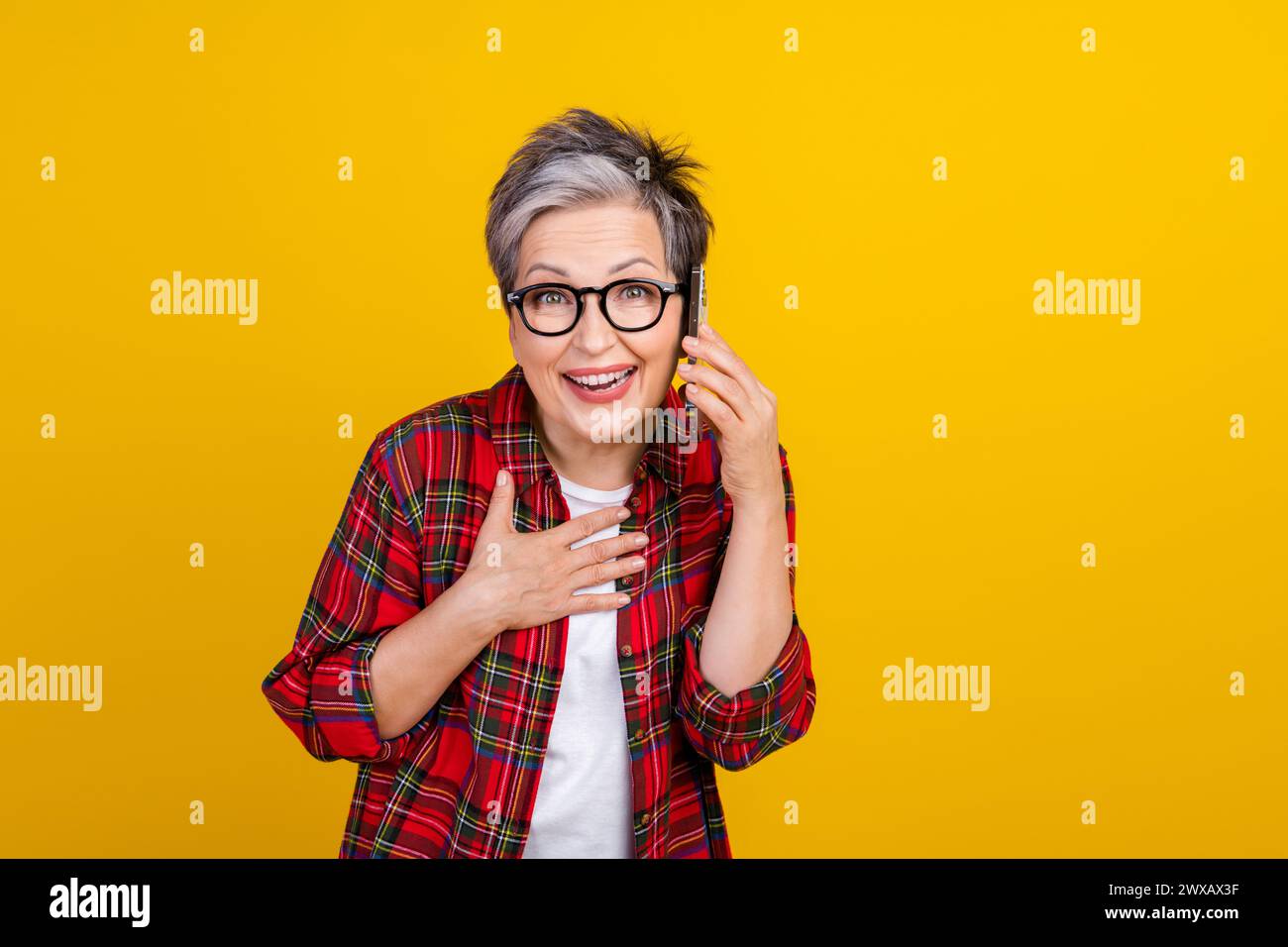Photo of cheerful astonished lady hand touch chest communicate ...