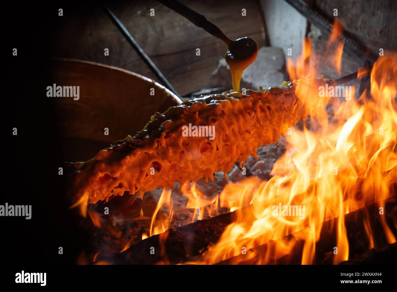 Wood-fired spit-roasted cake, Pyrenees-Atlantique, France Stock Photo ...