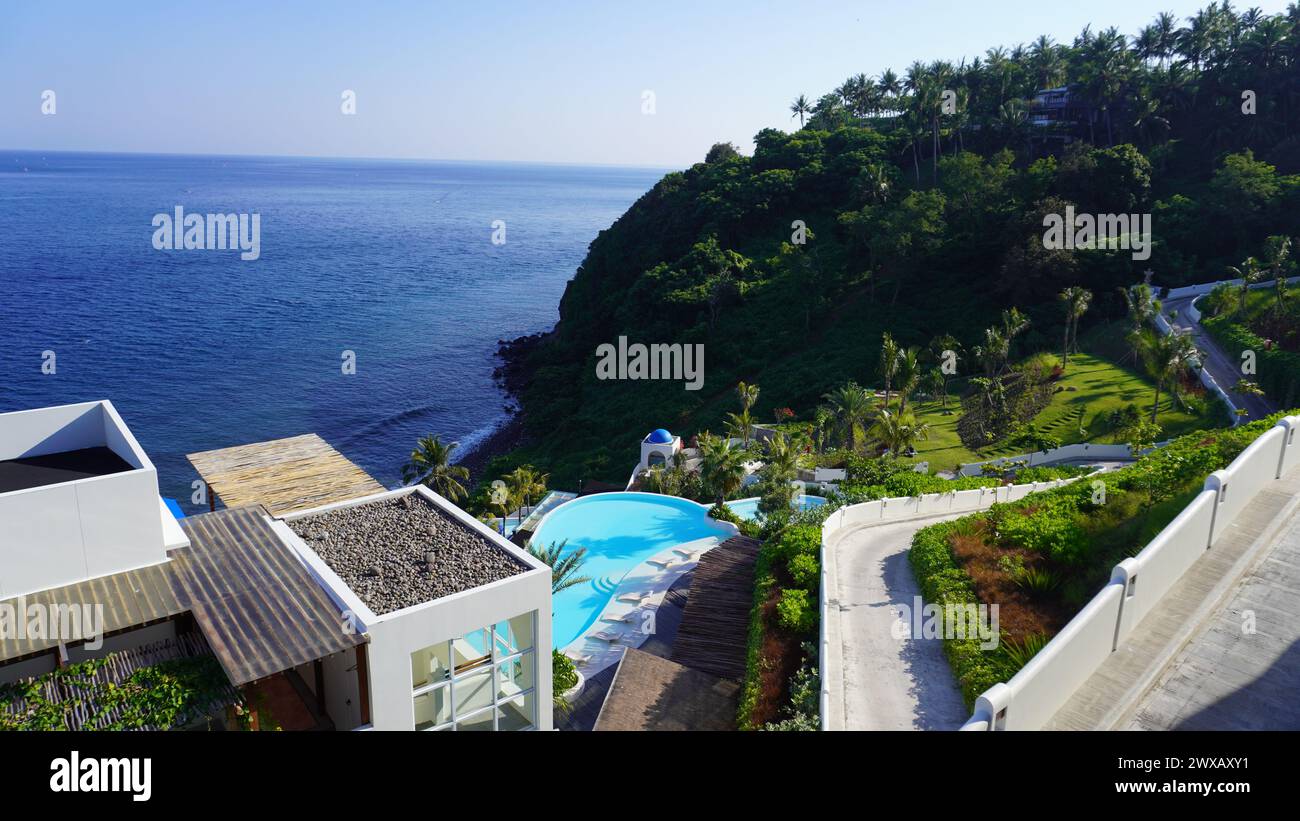 A view from a hotel located next to the beach and build on the hill ...