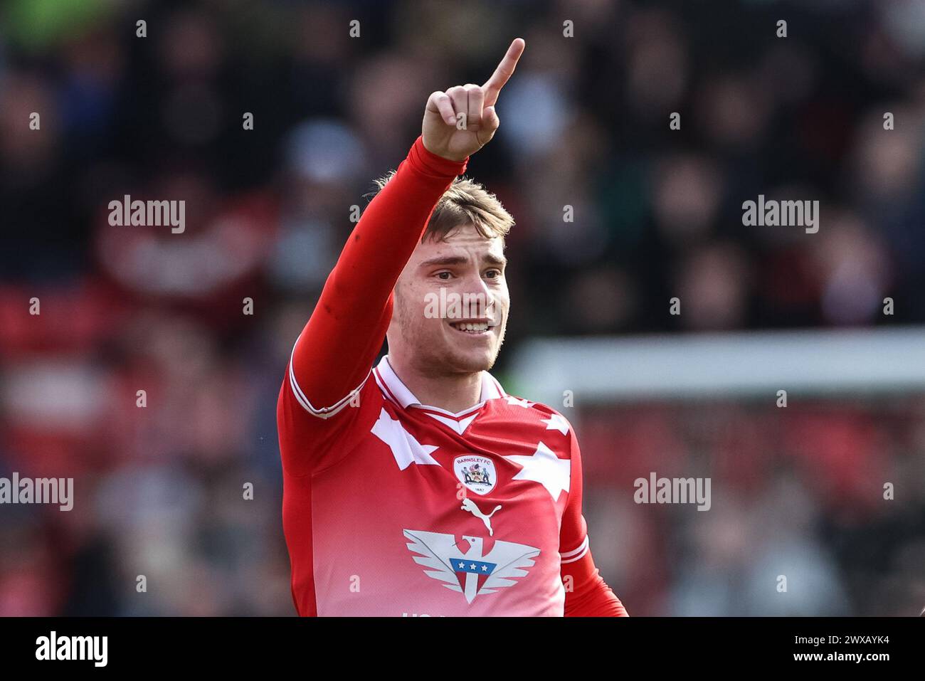 Luca Connell of Barnsley gives his team instructions during the Sky Bet ...